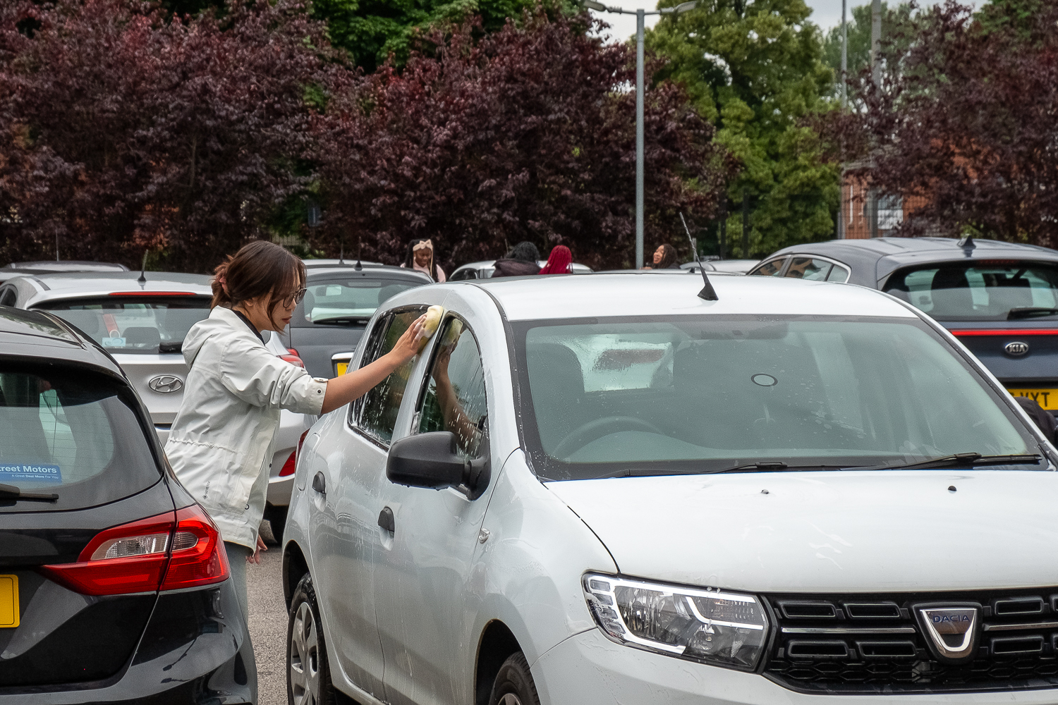 Charity Car Wash - Trinity High